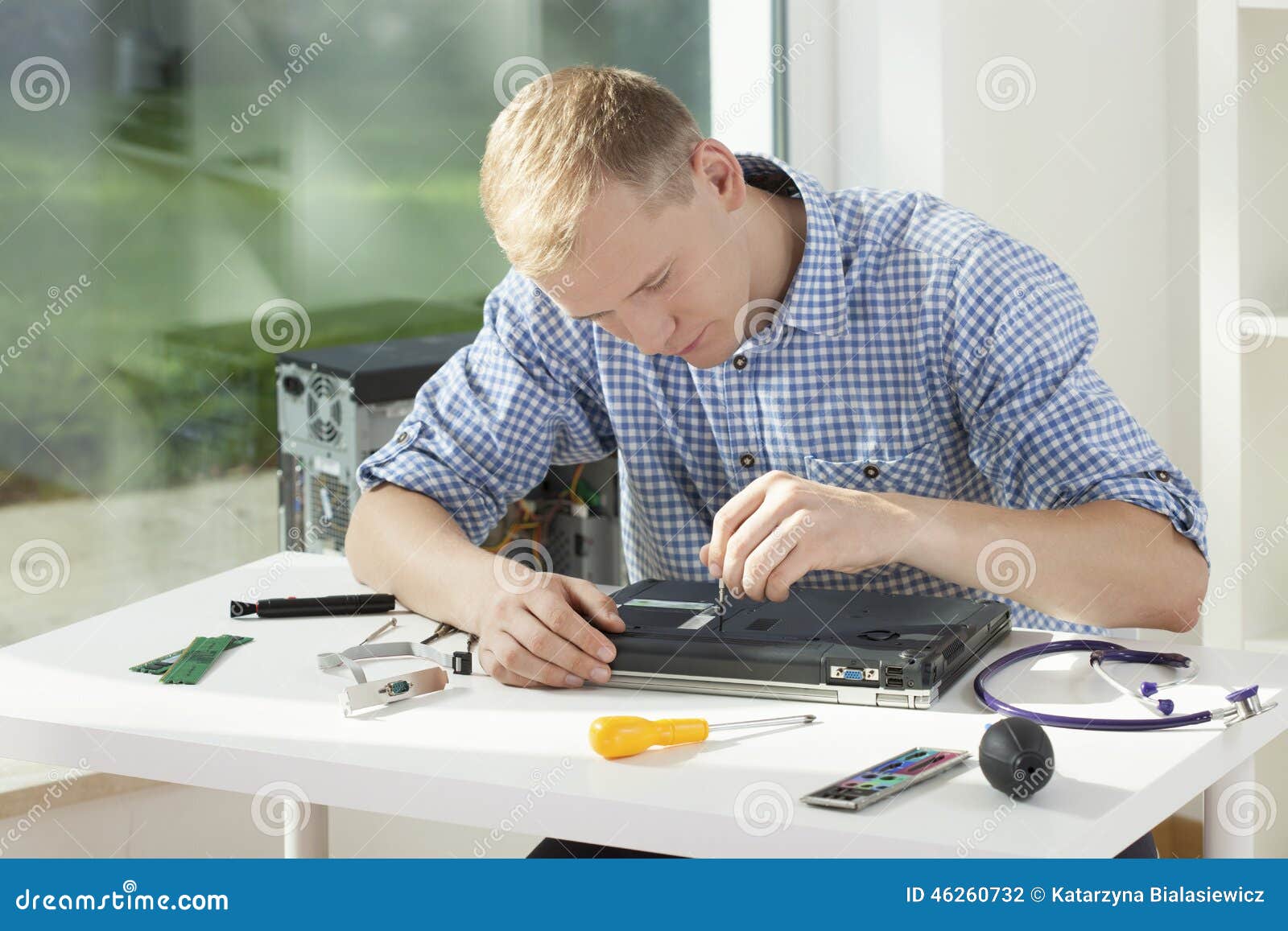 Young Man Fixing Laptop, Horizontal Stock Photo - Image of repair ...