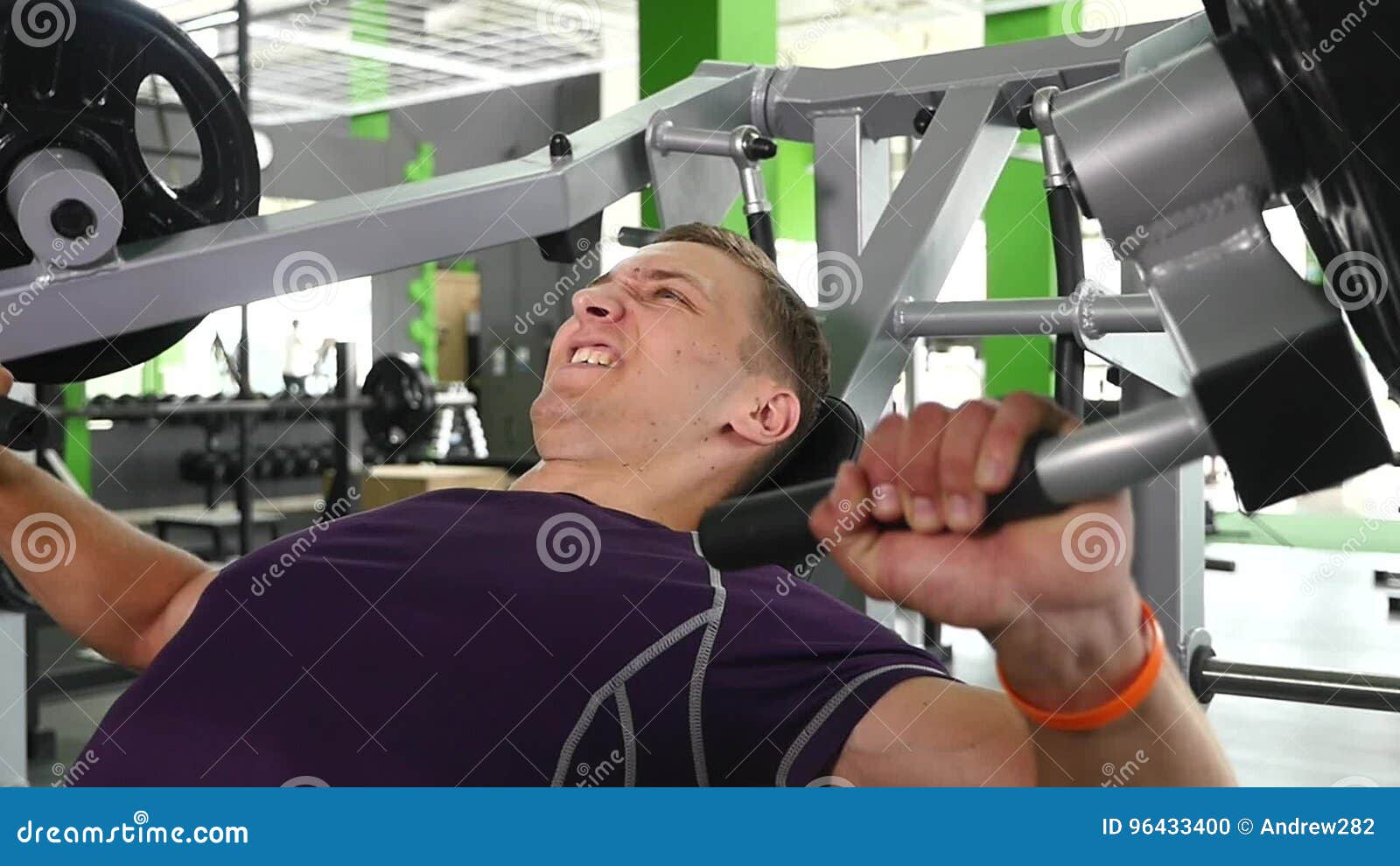 Young Man Flexing Chest Muscles on Gym Machine Stock Footage - Video of ...