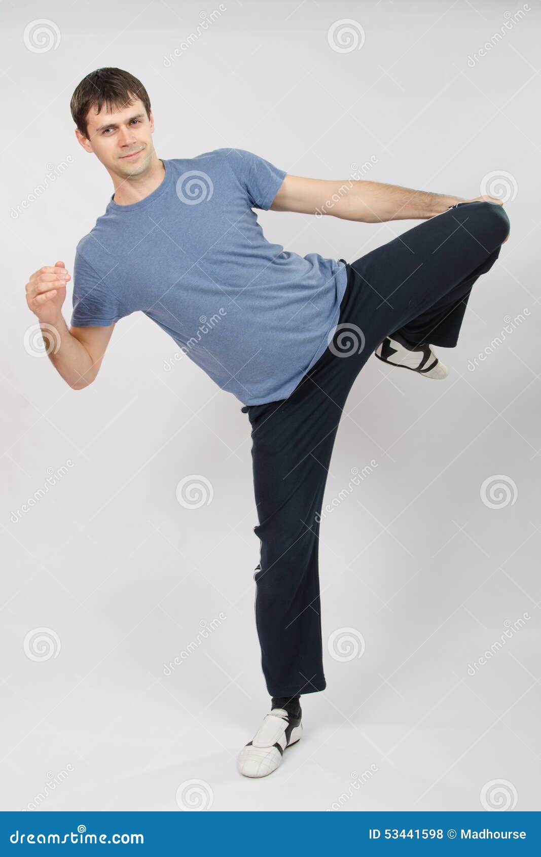 Young Man Flexing Muscles of the Legs Stock Photo - Image of health ...