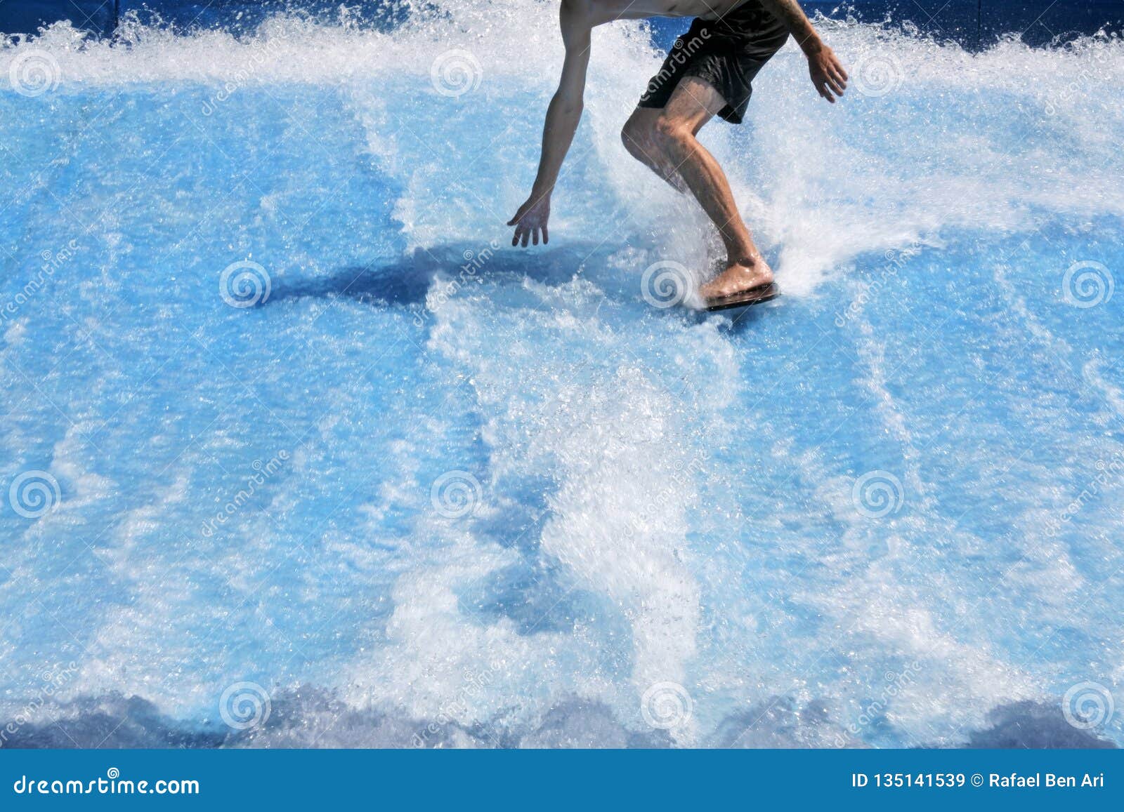 Young Man Flowriding and Flowboarding on Artificial Sheet Waves Stock ...