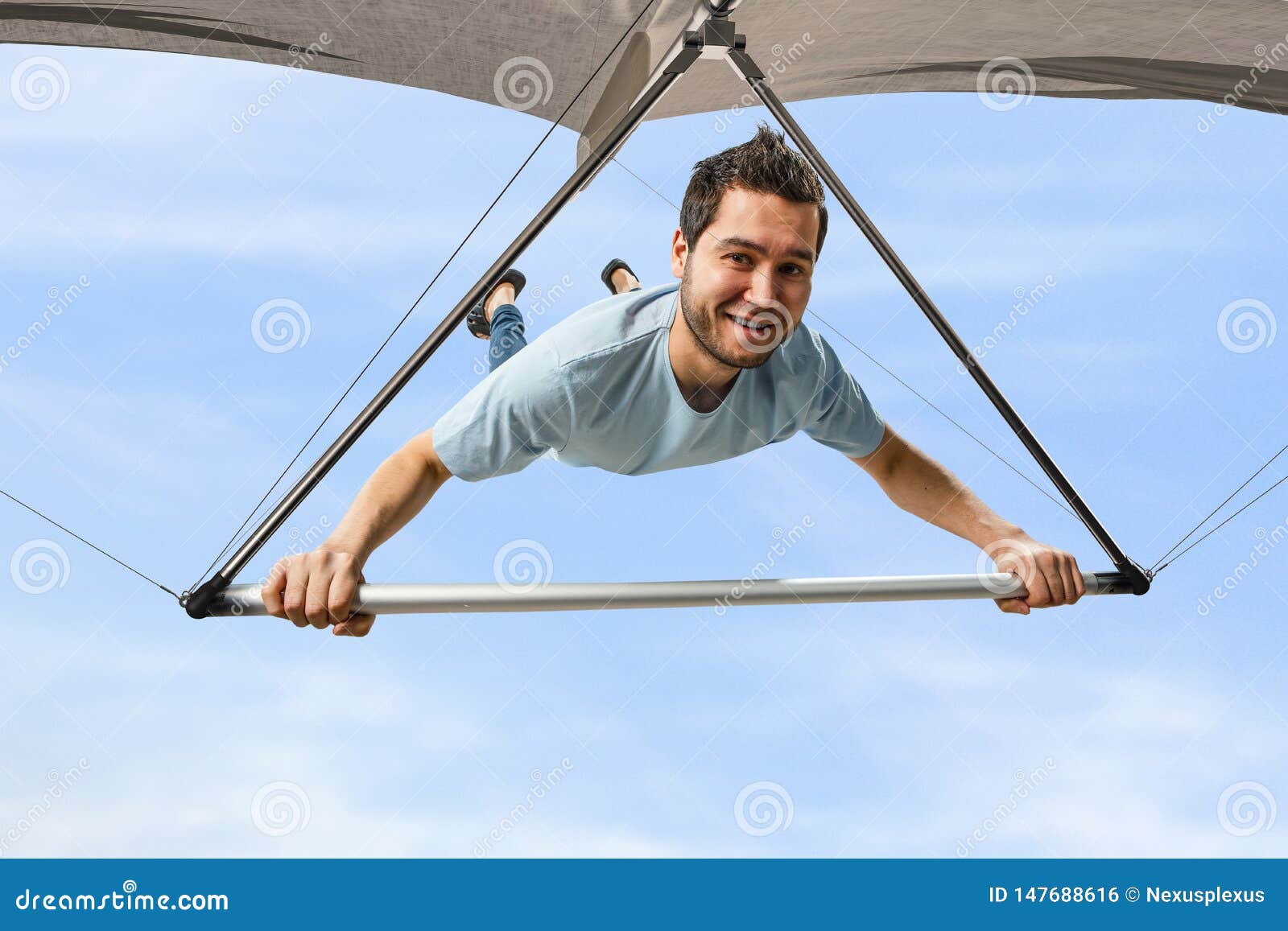 Young Man Flying on Hang Glider. Mixed Media Stock Photo - Image of ...