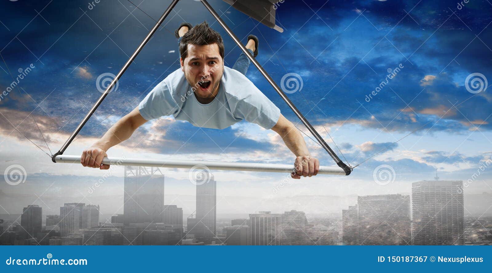 Young Man Flying on Hang Glider. Mixed Media Stock Image - Image of ...