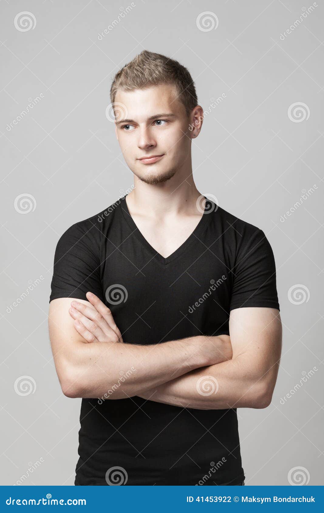 Young Man with Folded Arms Isolated on Gray Stock Photo - Image of ...