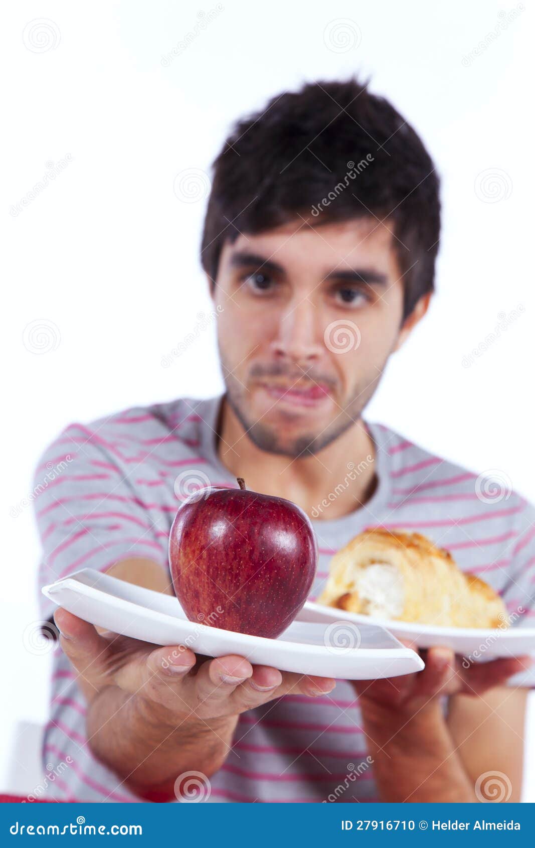 Young man food decision stock photo. Image of apple, hungry - 27916710