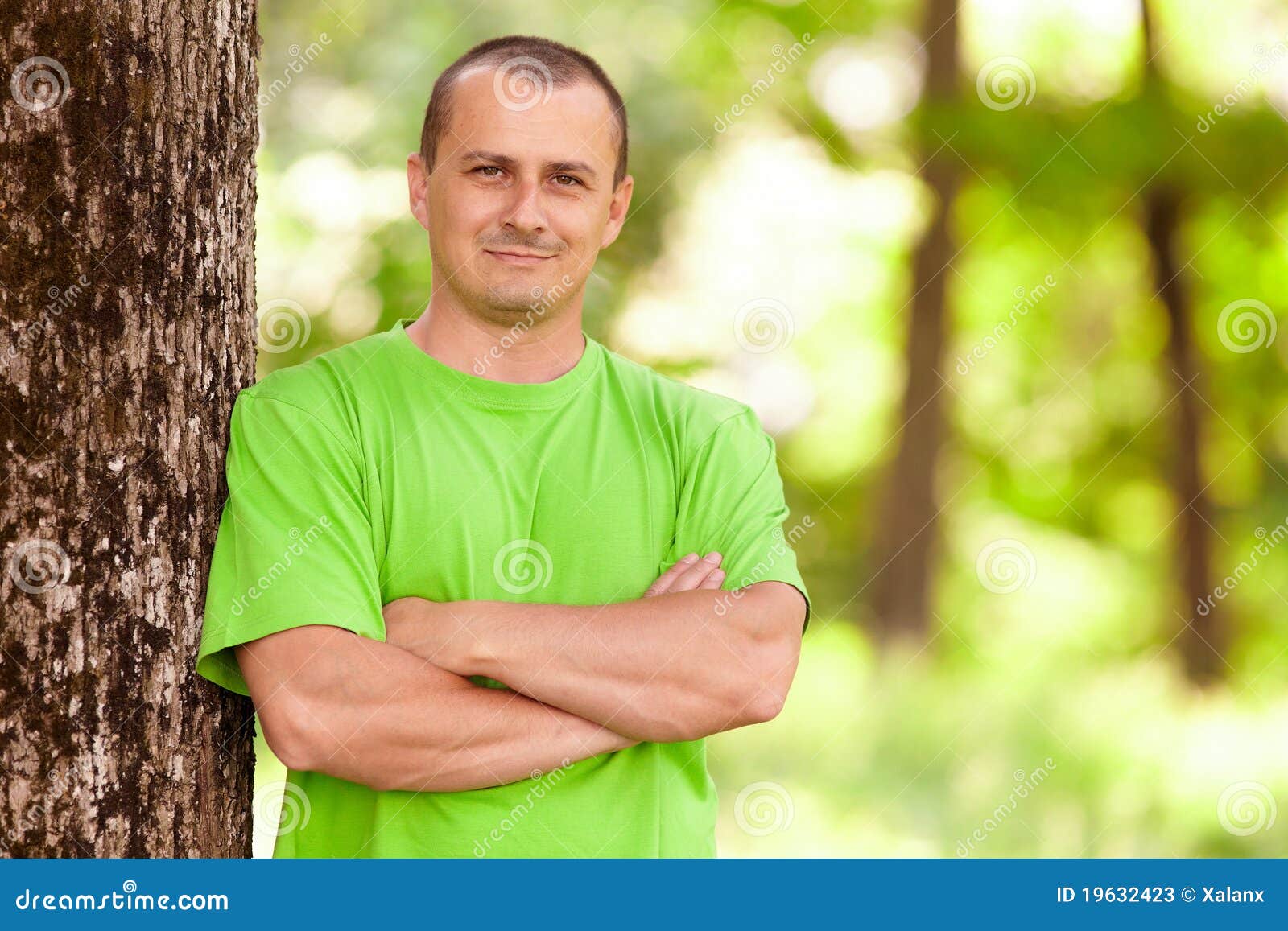 Young man in the forest stock image. Image of green, relaxed - 19632423