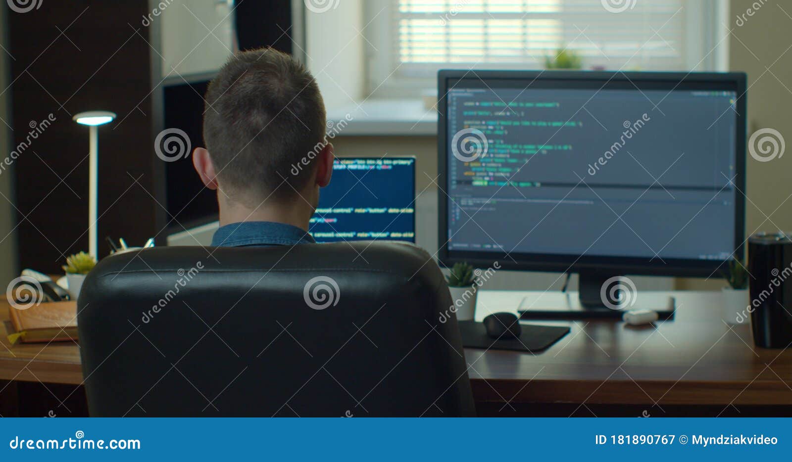 Young Man Freelancer Coding Html and Programming on Two Screen Monitors, Development Web ...
