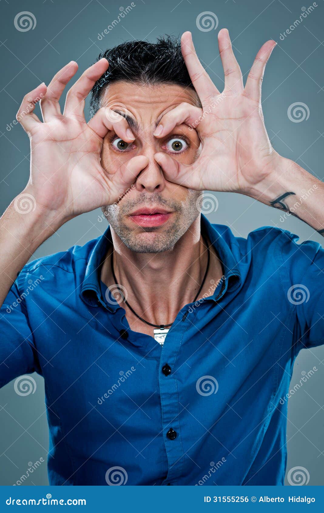 Young Man with Funny Expression Stock Photo - Image of head, looking ...