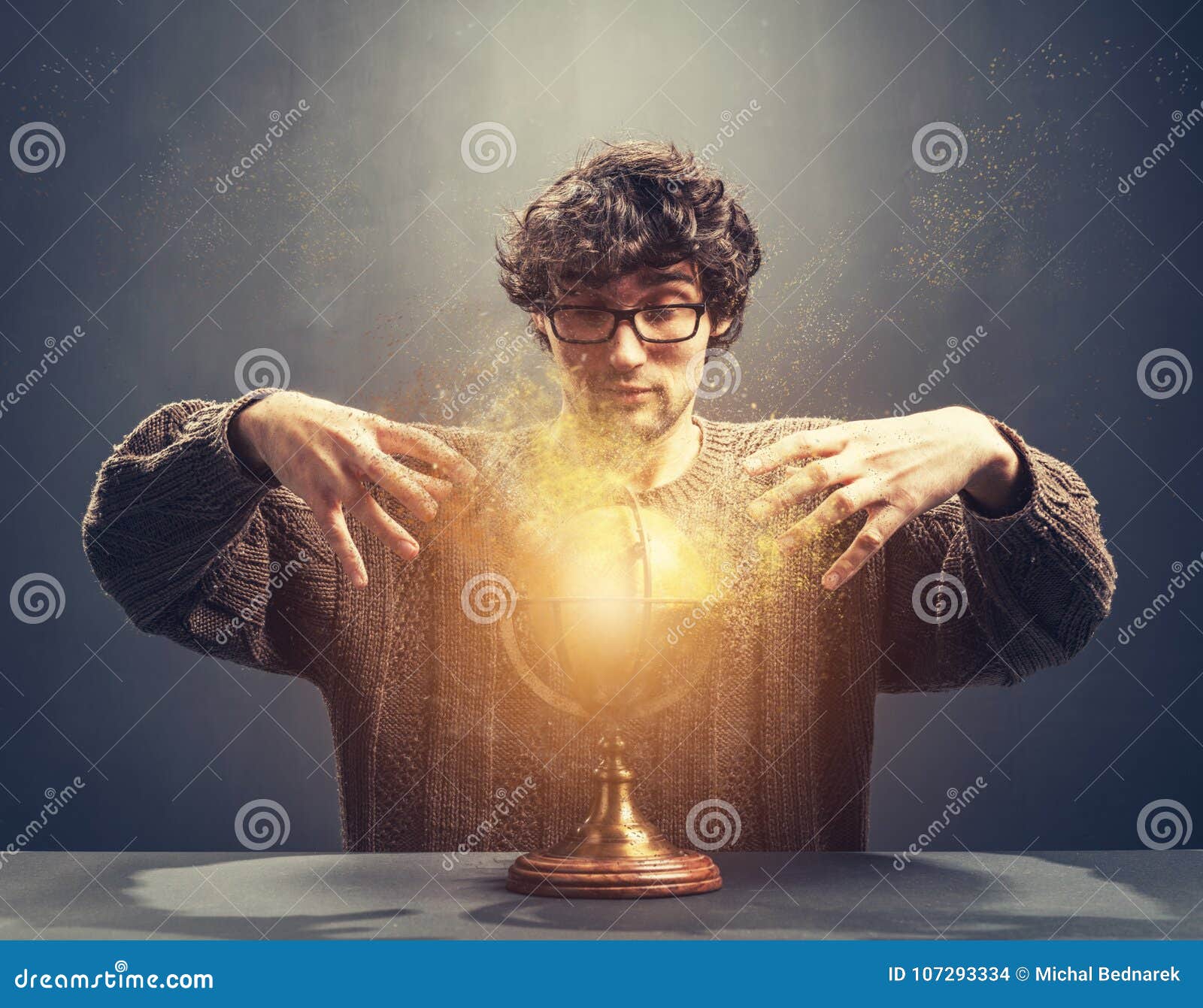 Young Man Gazing at the Glowing Crystal Ball. Stock Photo - Image of ...