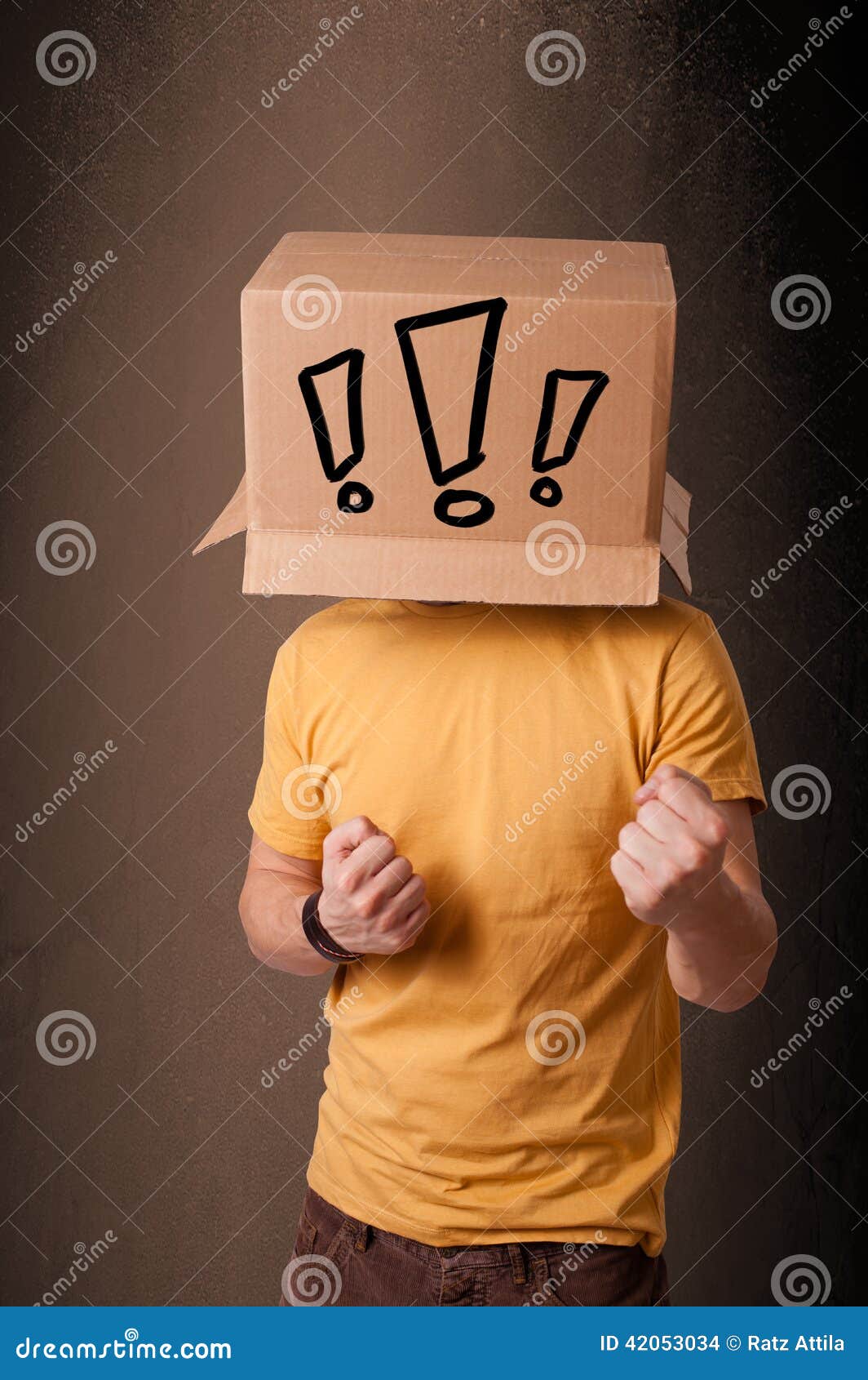 Young Man Gesturing with a Cardboard Box on His Head with Exclamation ...