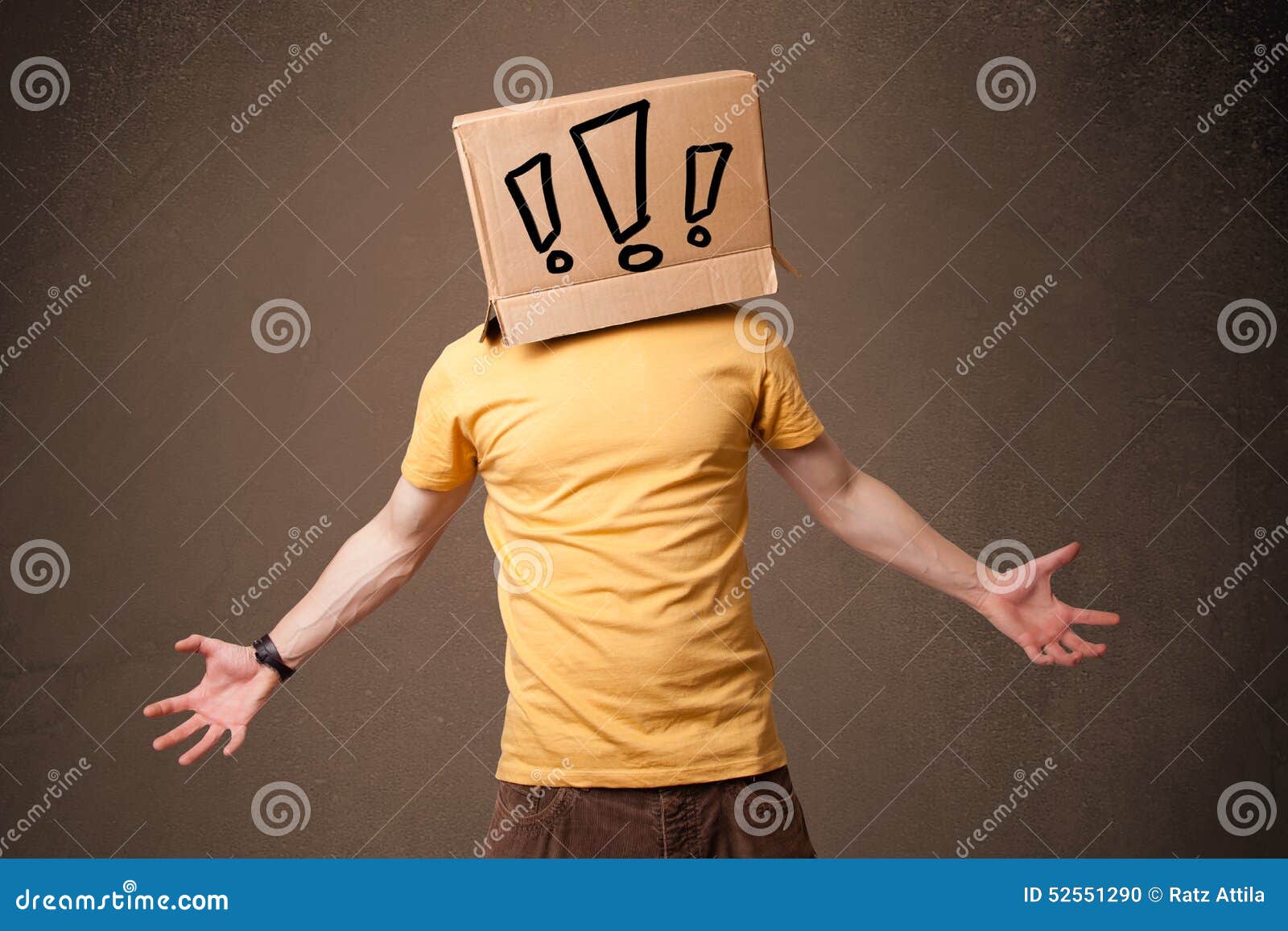 Young Man Gesturing with a Cardboard Box on His Head with Exclam Stock ...