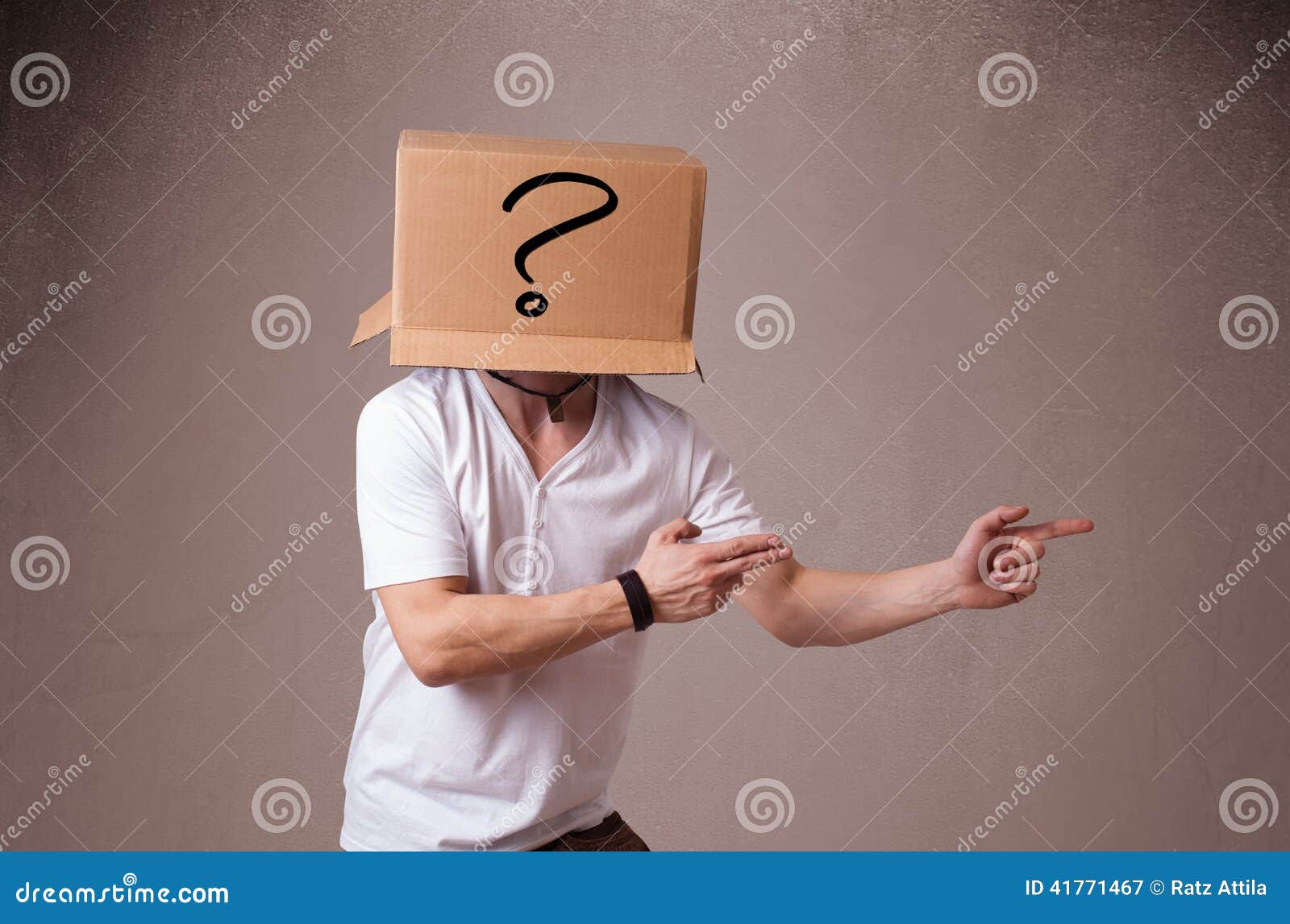 Young Man Gesturing with a Cardboard Box on His Head with Question Mark ...