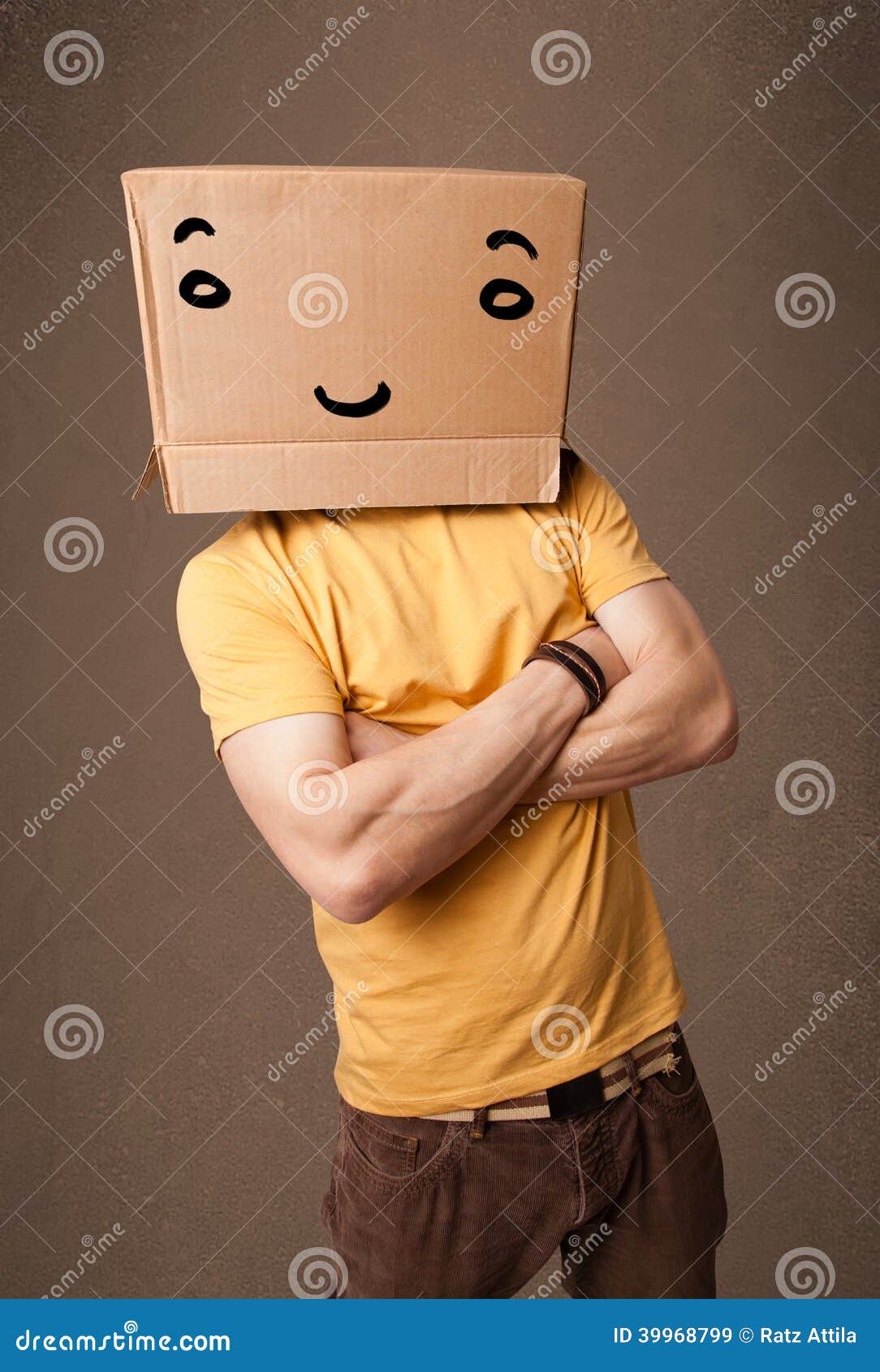Young Man Gesturing with a Cardboard Box on His Head with Smiley Stock ...