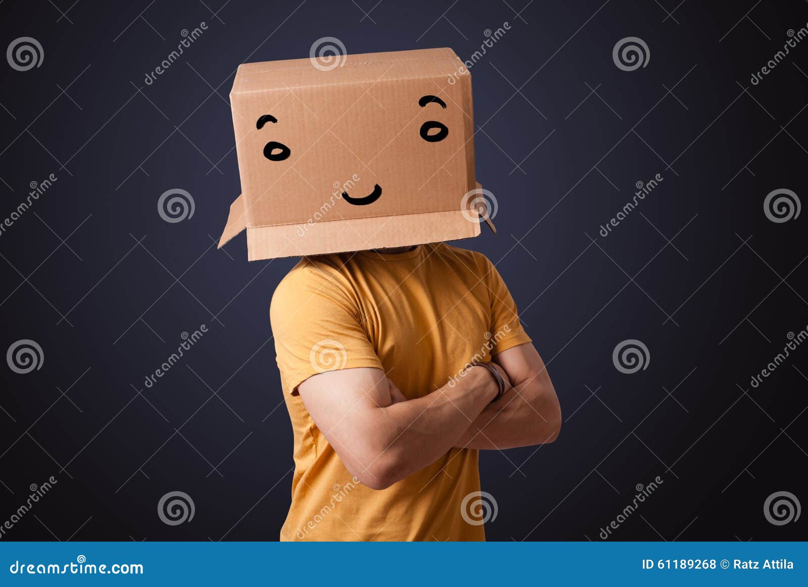 Young Man Gesturing with a Cardboard Box on His Head with Smiley Stock ...