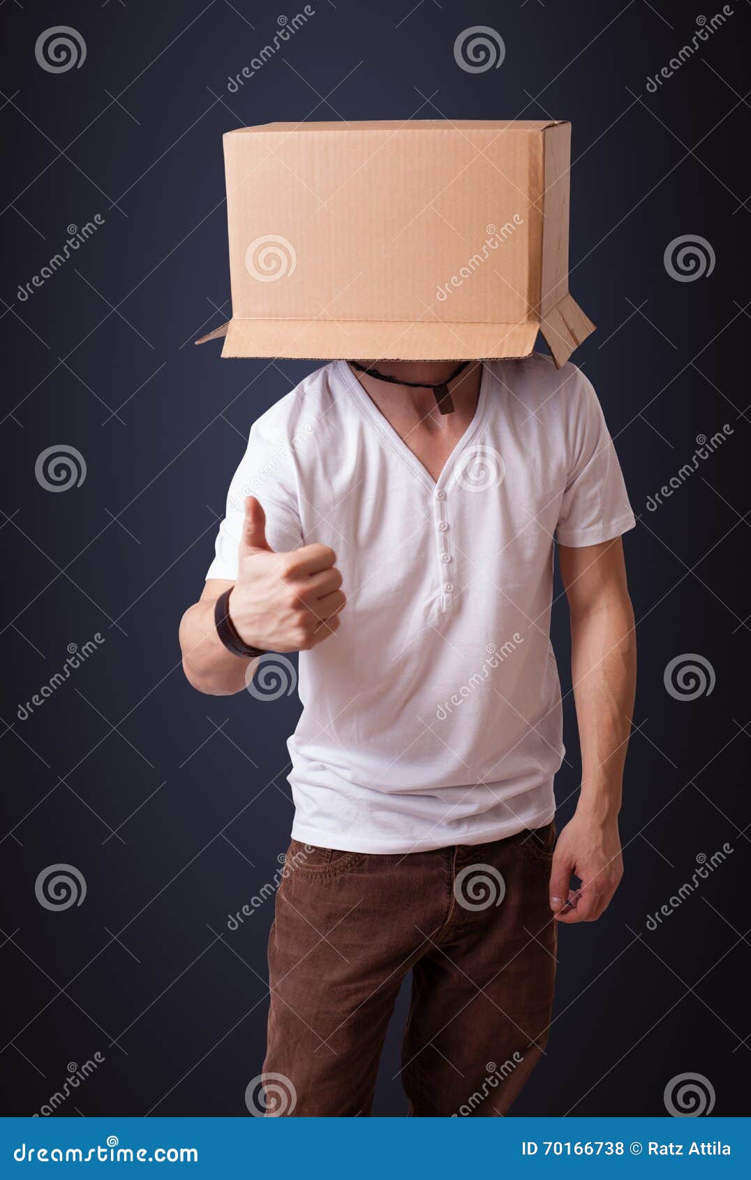 Young Man Gesturing with a Cardboard Box on His Head Stock Photo ...