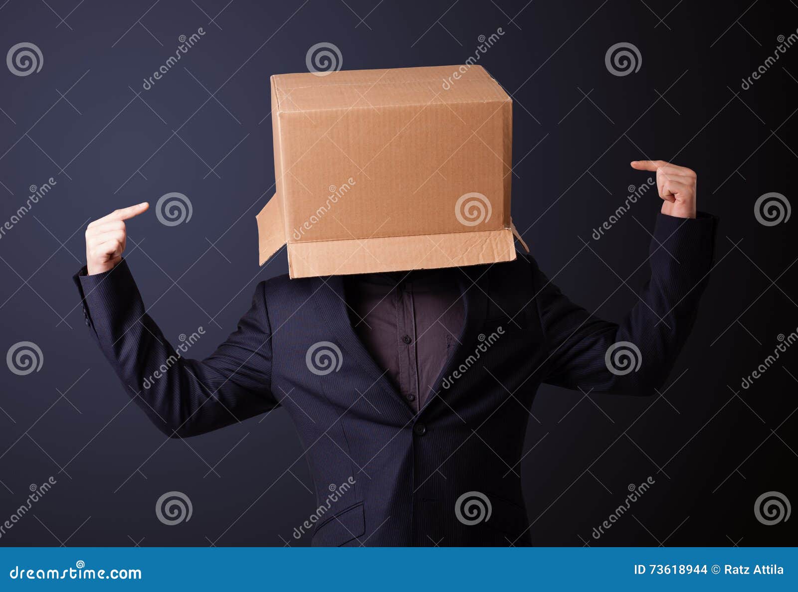 Young Man Gesturing with a Cardboard Box on His Head Stock Photo ...