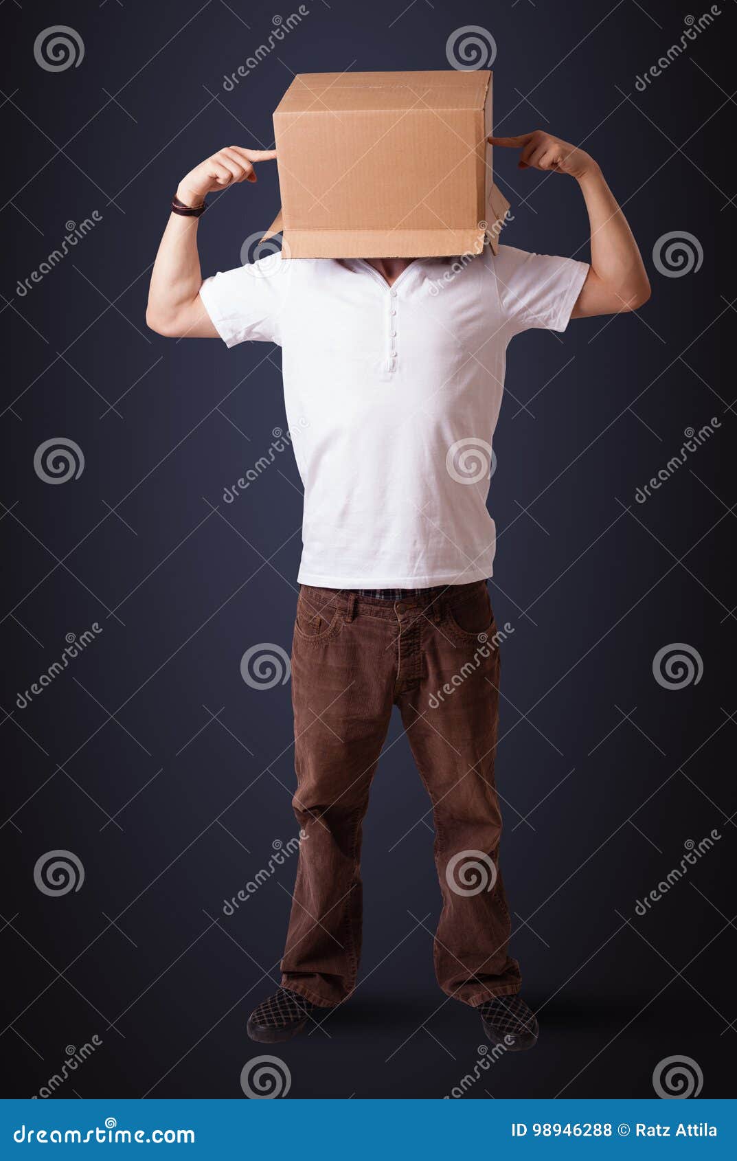 Young Man Gesturing with a Cardboard Box on His Head Stock Photo ...