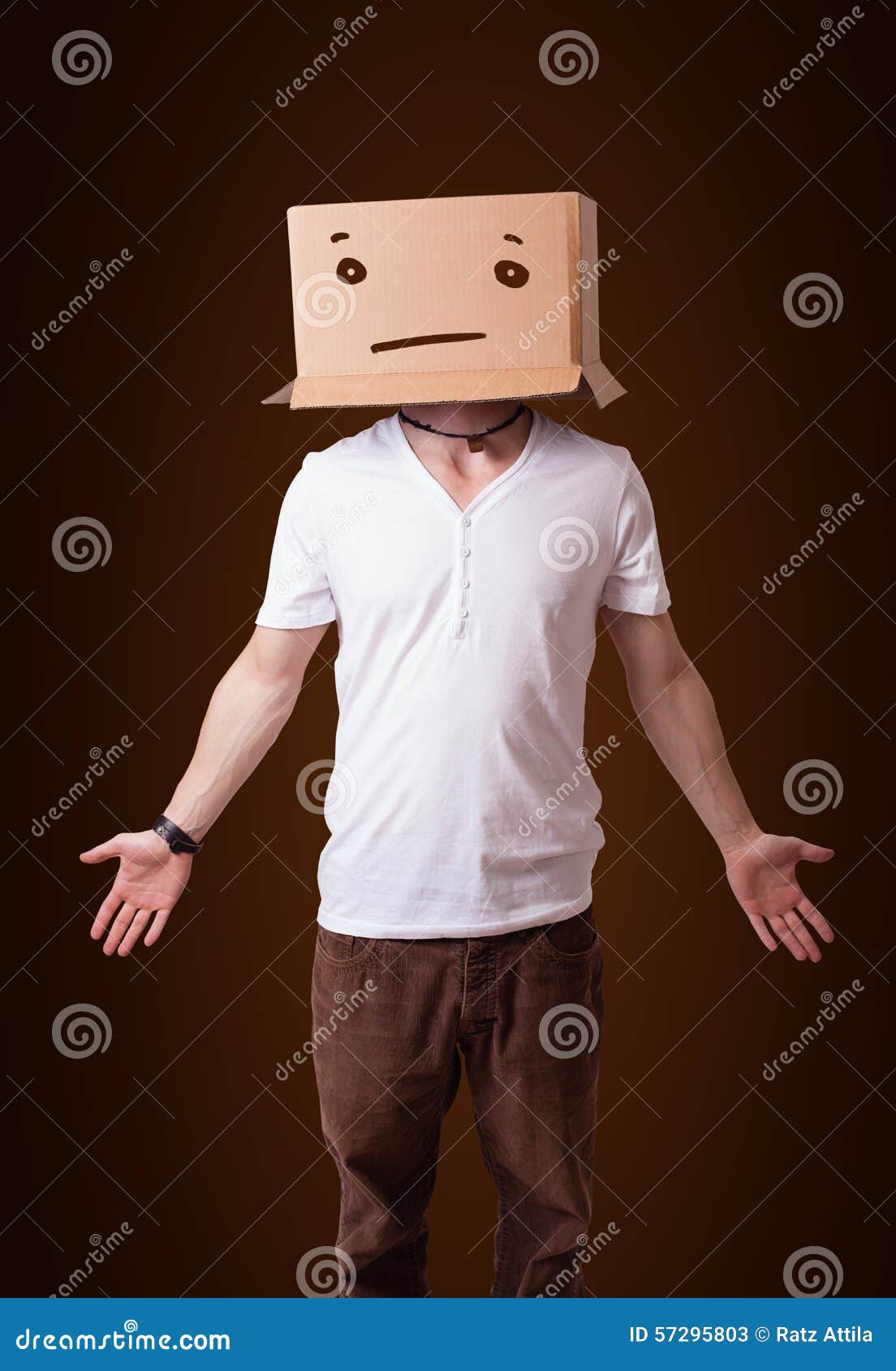 Young Man Gesturing with a Cardboard Box on His Head with Straig Stock ...