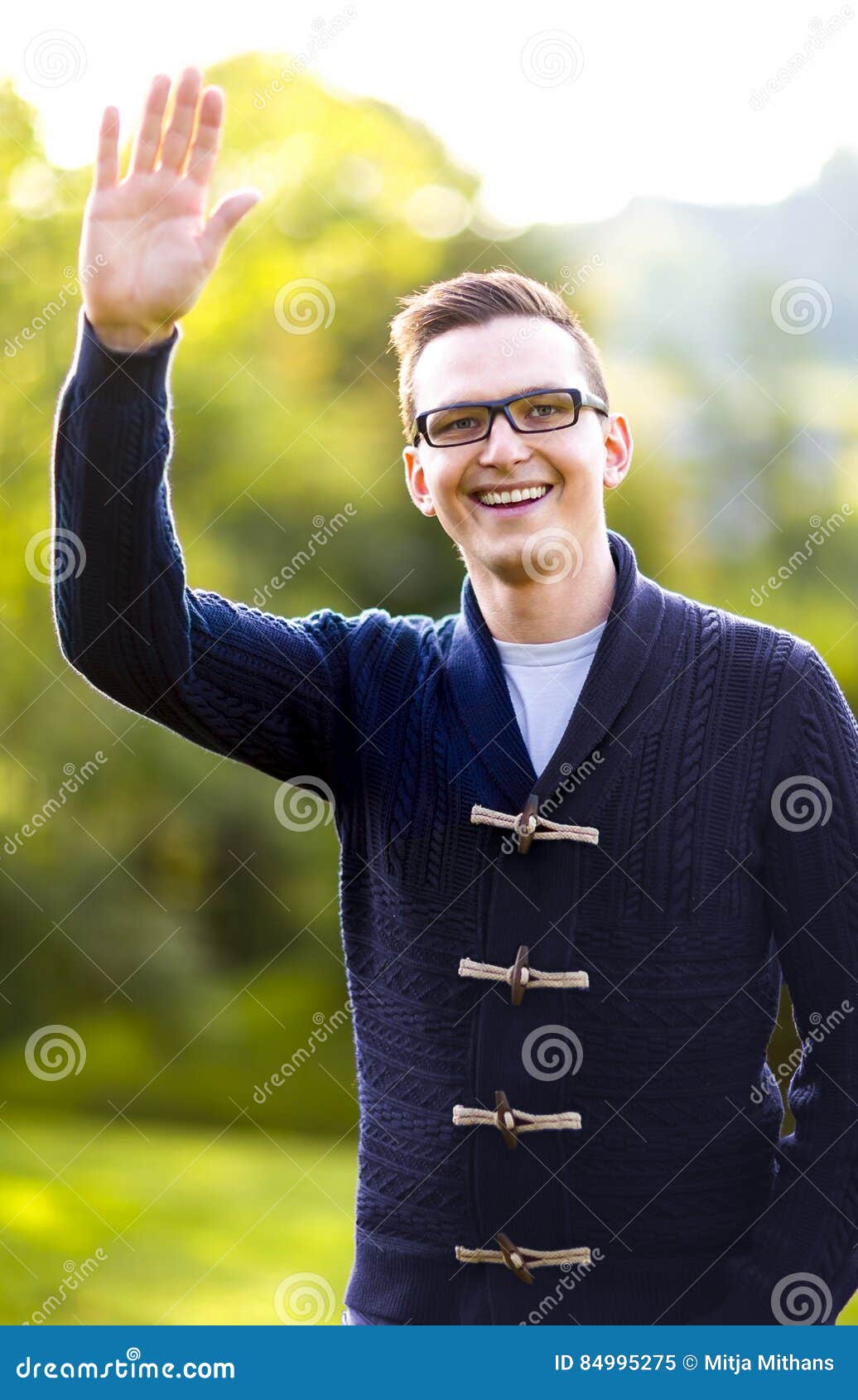 Young man gesturing hello stock image. Image of adult - 84995275