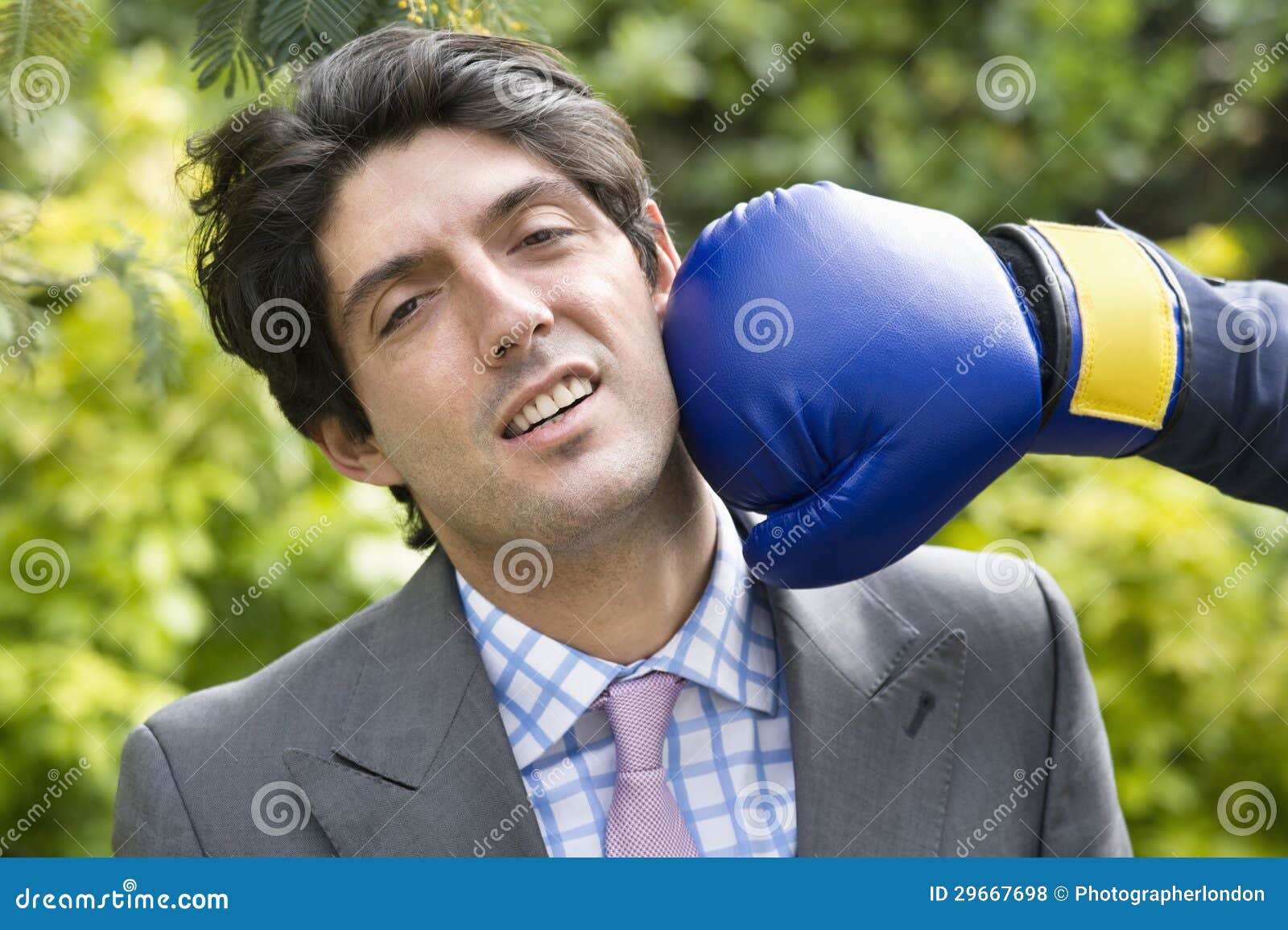 Young man getting hit stock photo. Image of outdoors - 29667698