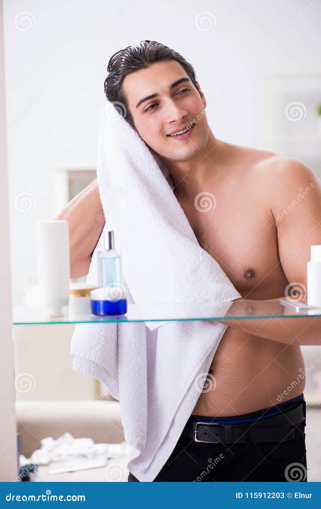 The Young Man is Getting Prepared for Working Day in Bathroom Stock ...