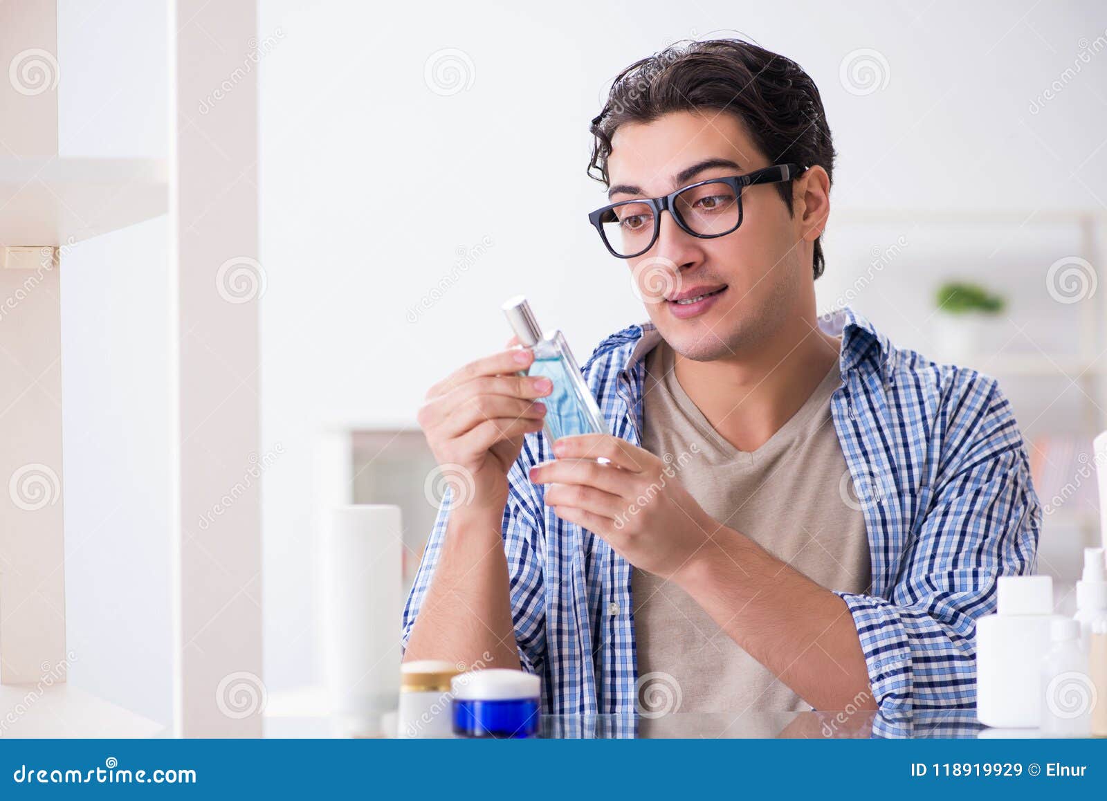 The Young Man is Getting Prepared for Working Day in Bathroom Stock ...