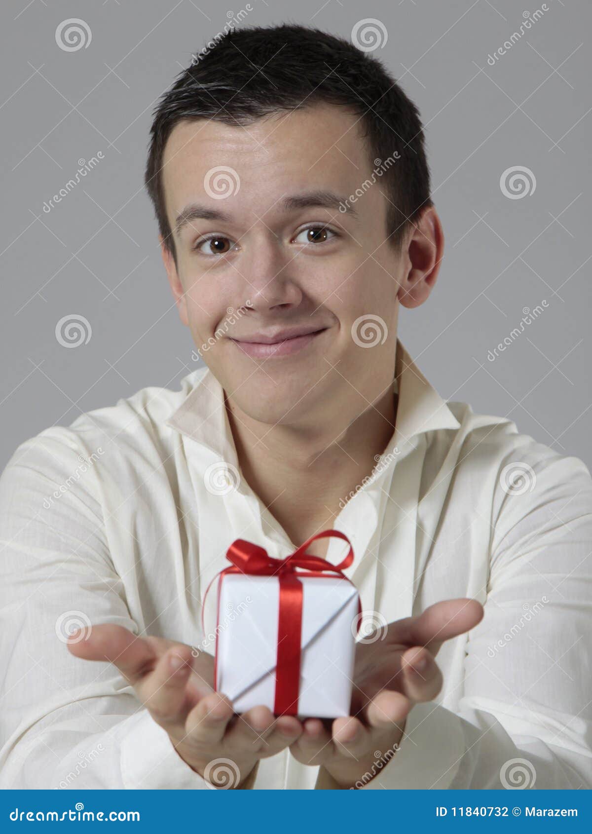 Young man with gift stock photo. Image of necktie, cheerful - 11840732