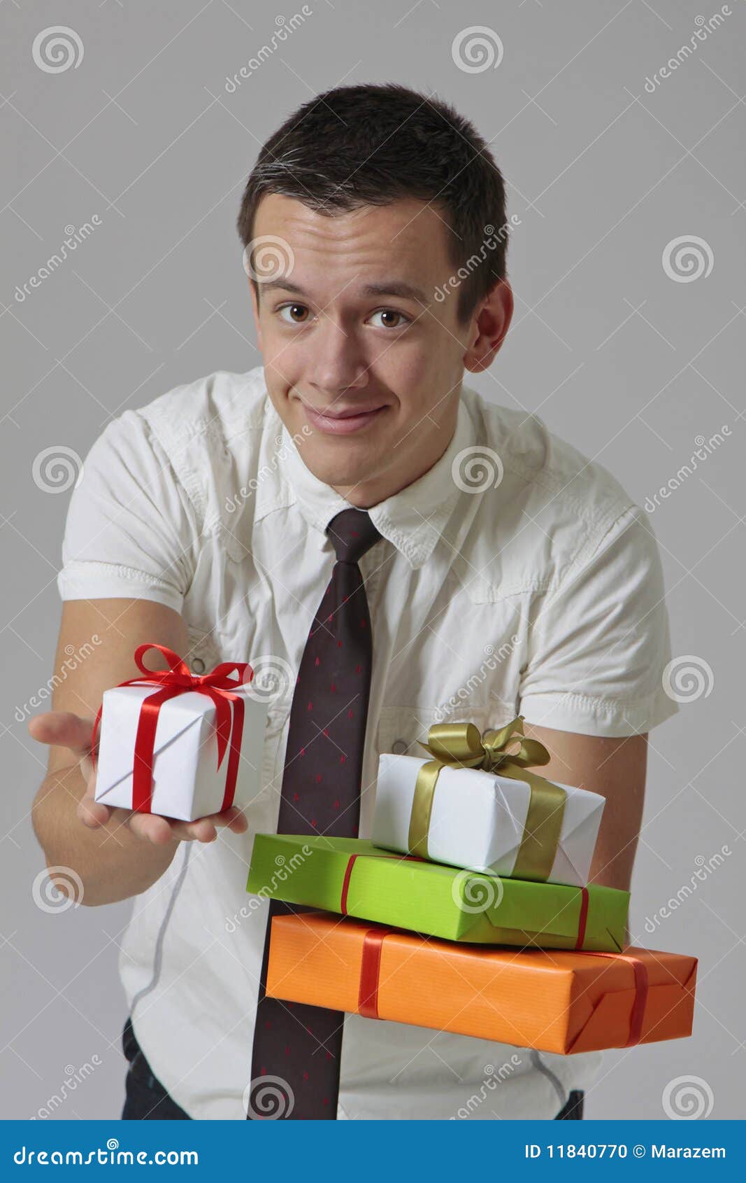 Young man with gifts stock photo. Image of isolated, cheerful - 11840770