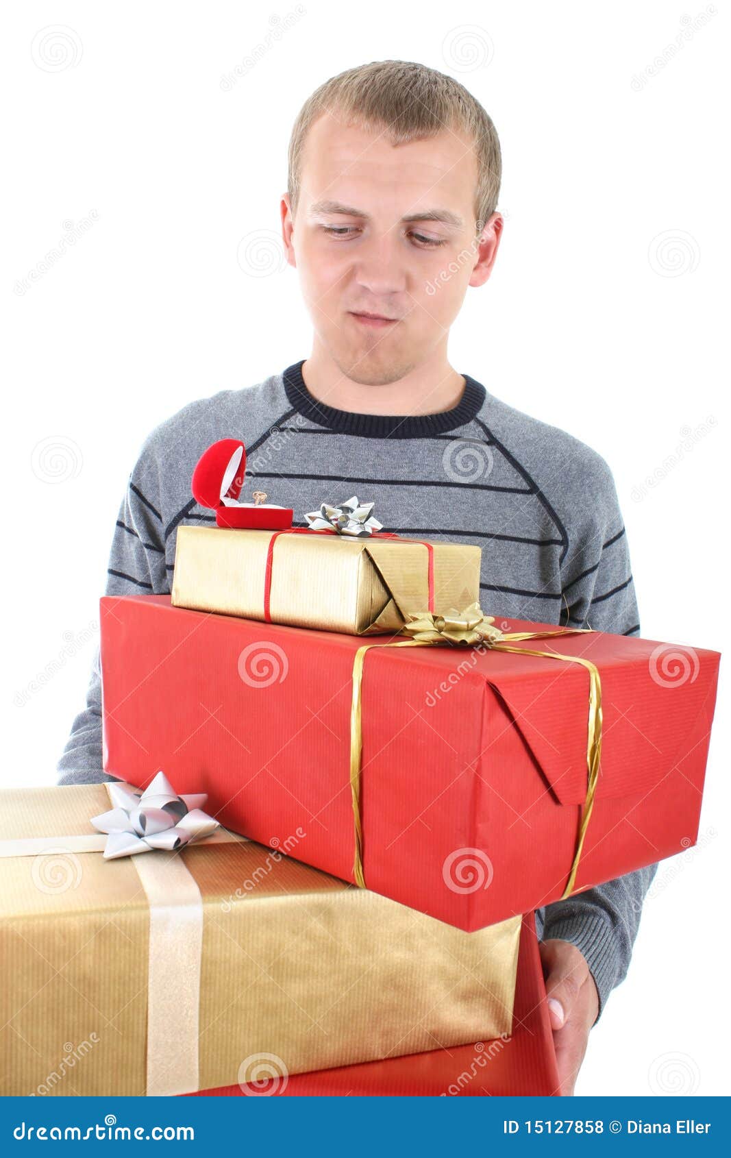 Young man with gifts stock photo. Image of engagement - 15127858