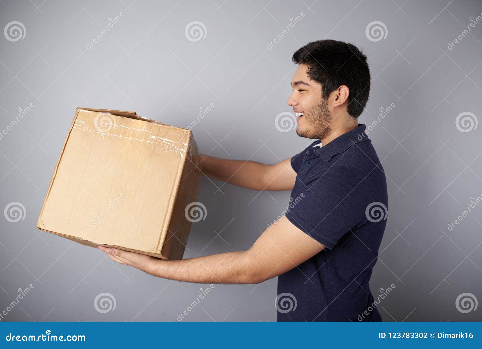 Young man give package box stock photo. Image of packaging - 123783302