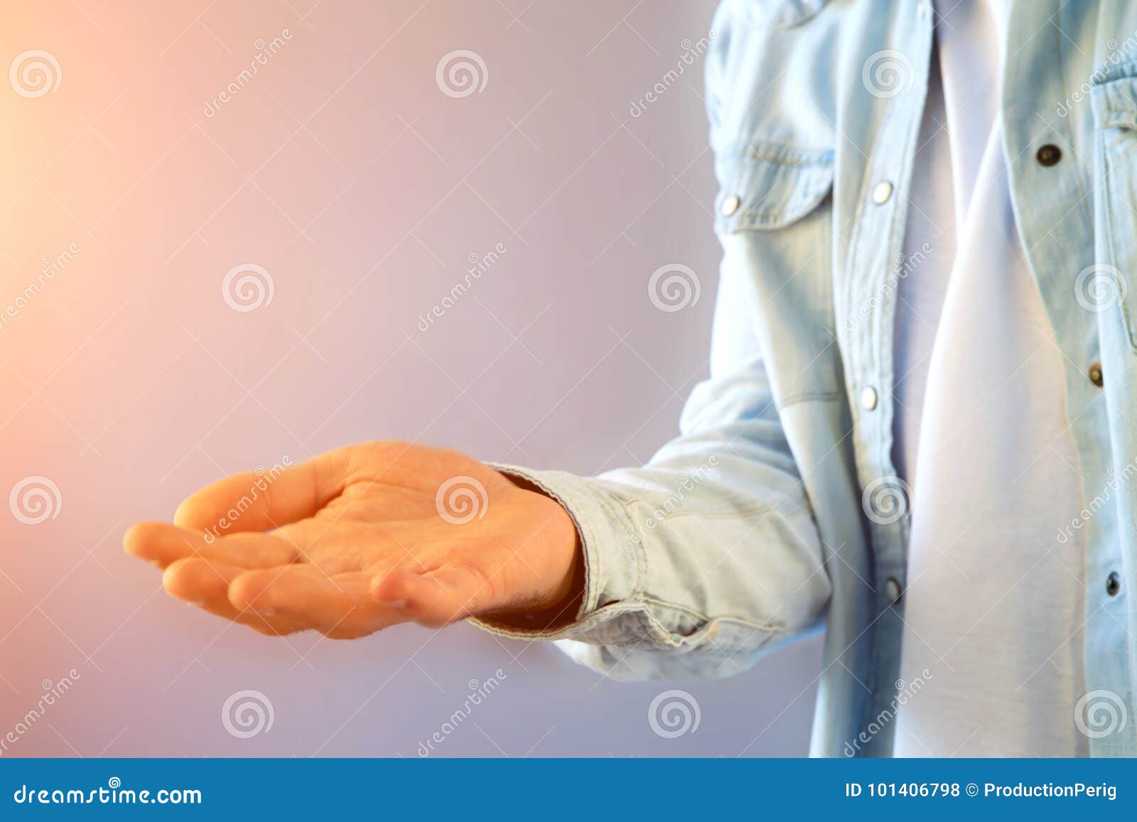 Young Man Giving an Empty Hand on a Color Background Stock Photo ...