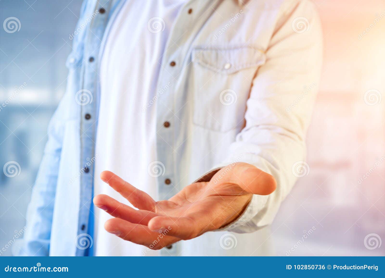 Young Man Giving an Empty Hand at the Office Stock Photo - Image of ...
