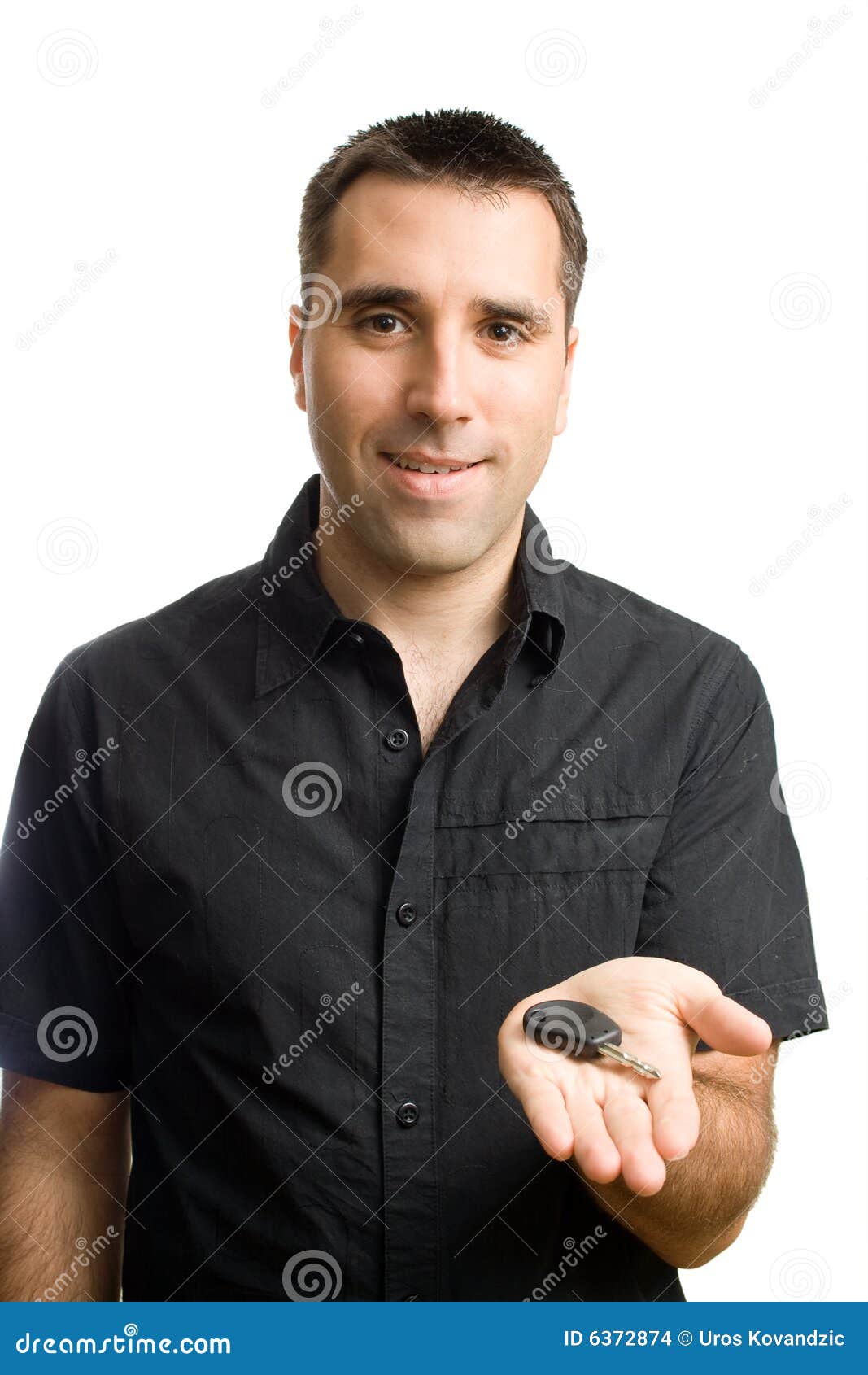 Young Man Giving Key in His Hand Stock Photo - Image of black, hold ...