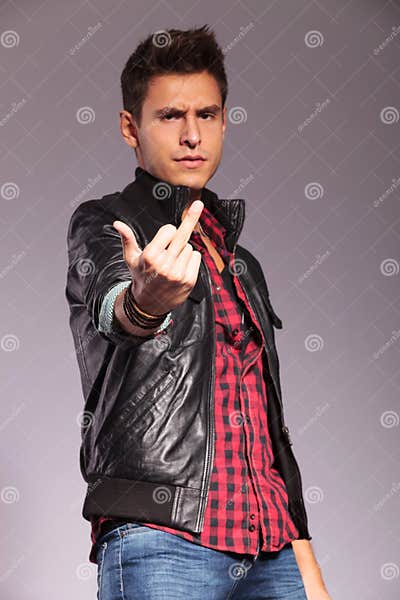 Young Man Giving the Middle Finger Stock Photo - Image of anger, jacket ...