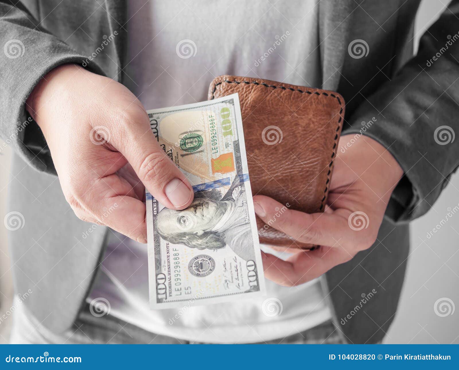 Man Giving Money from His Wallet Stock Photo - Image of dollar, giving ...