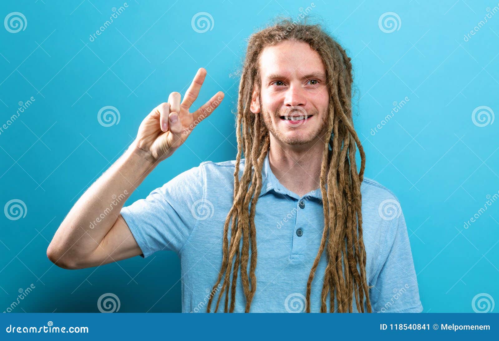 Young Man Giving the Peace Sign Stock Image - Image of caucasian ...