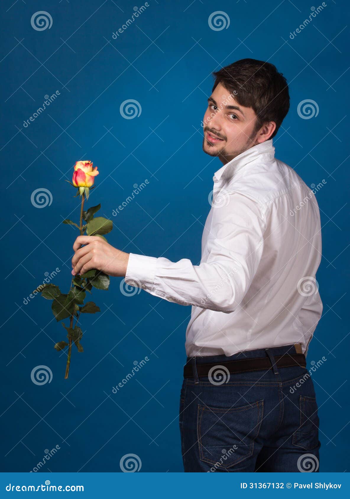 Young Man Giving a Red Rose Stock Photo - Image of casual, elegance ...