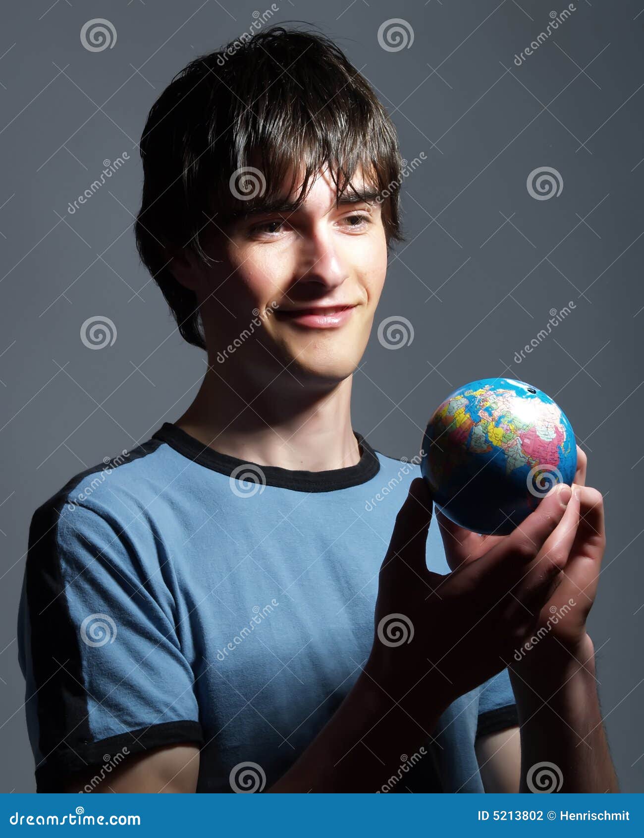 Young man with a globe stock photo. Image of charming - 5213802 Young man with a globe stock photo. Image of charming - 5213802