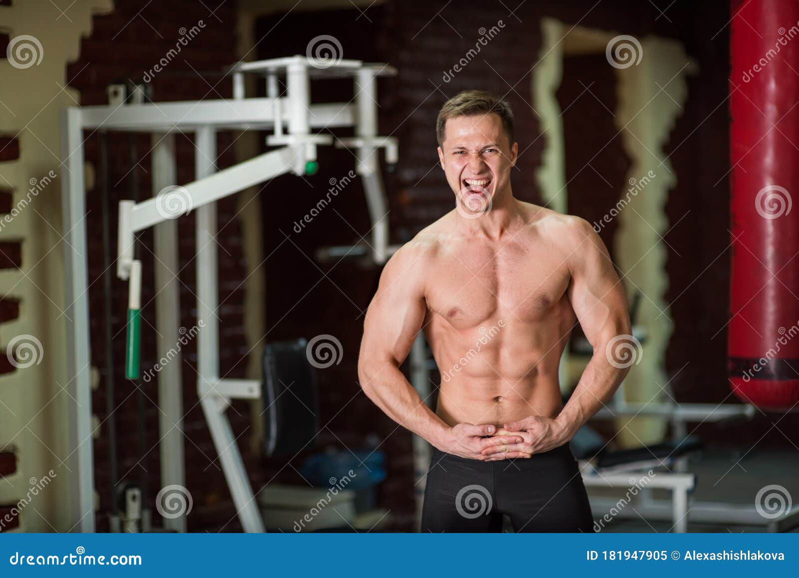 Young Man with Good Body in the Gym Stock Image - Image of athletic ...