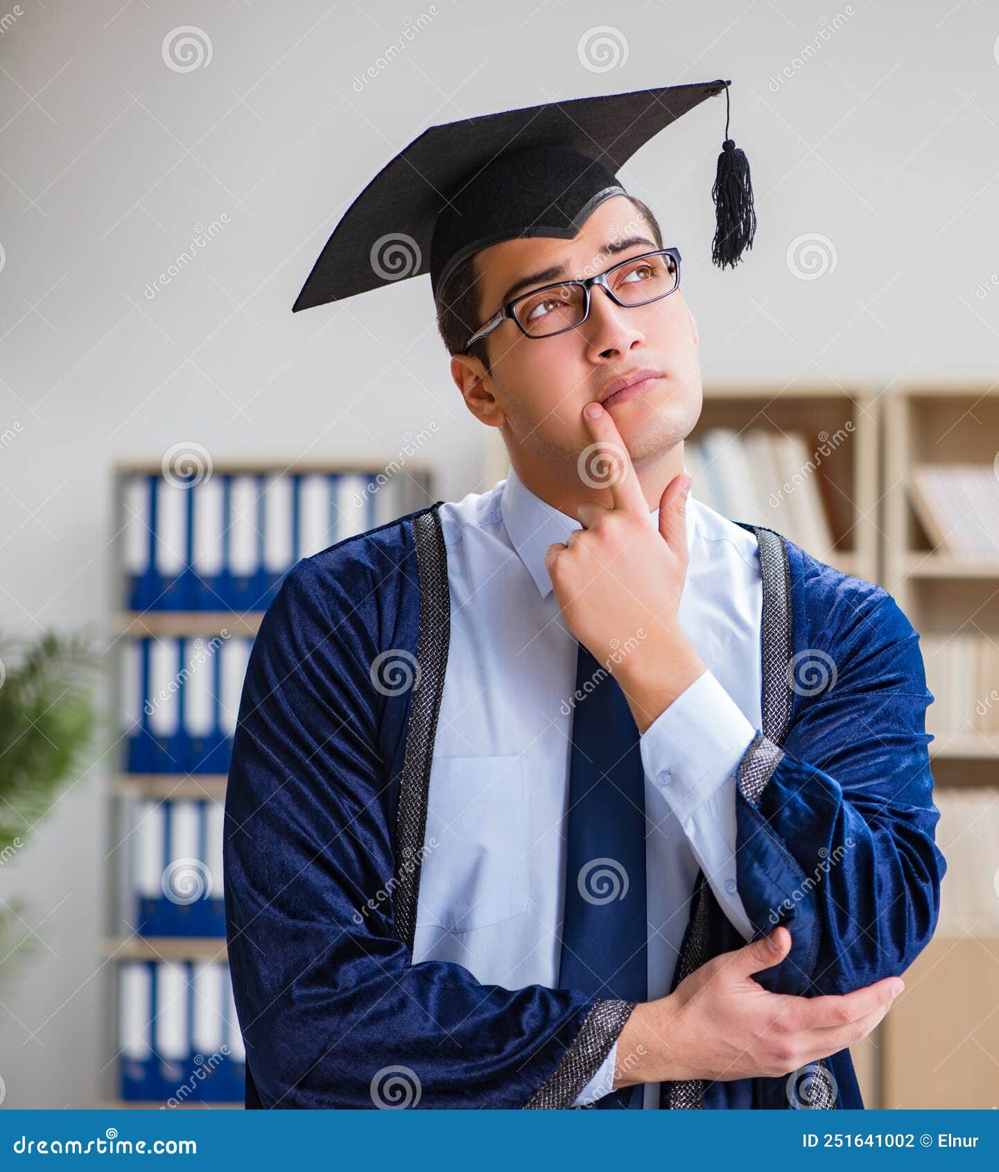 Young Man Graduating from University Stock Photo - Image of books ...