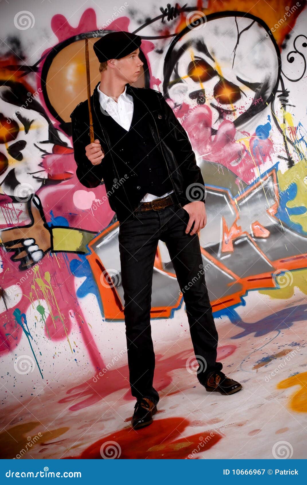 Young man, graffiti wall stock image. Image of street - 10666967