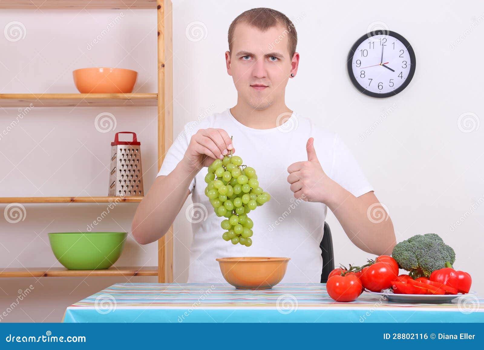 Young Man with Grape in the Kitchen Stock Photo - Image of fruit ...