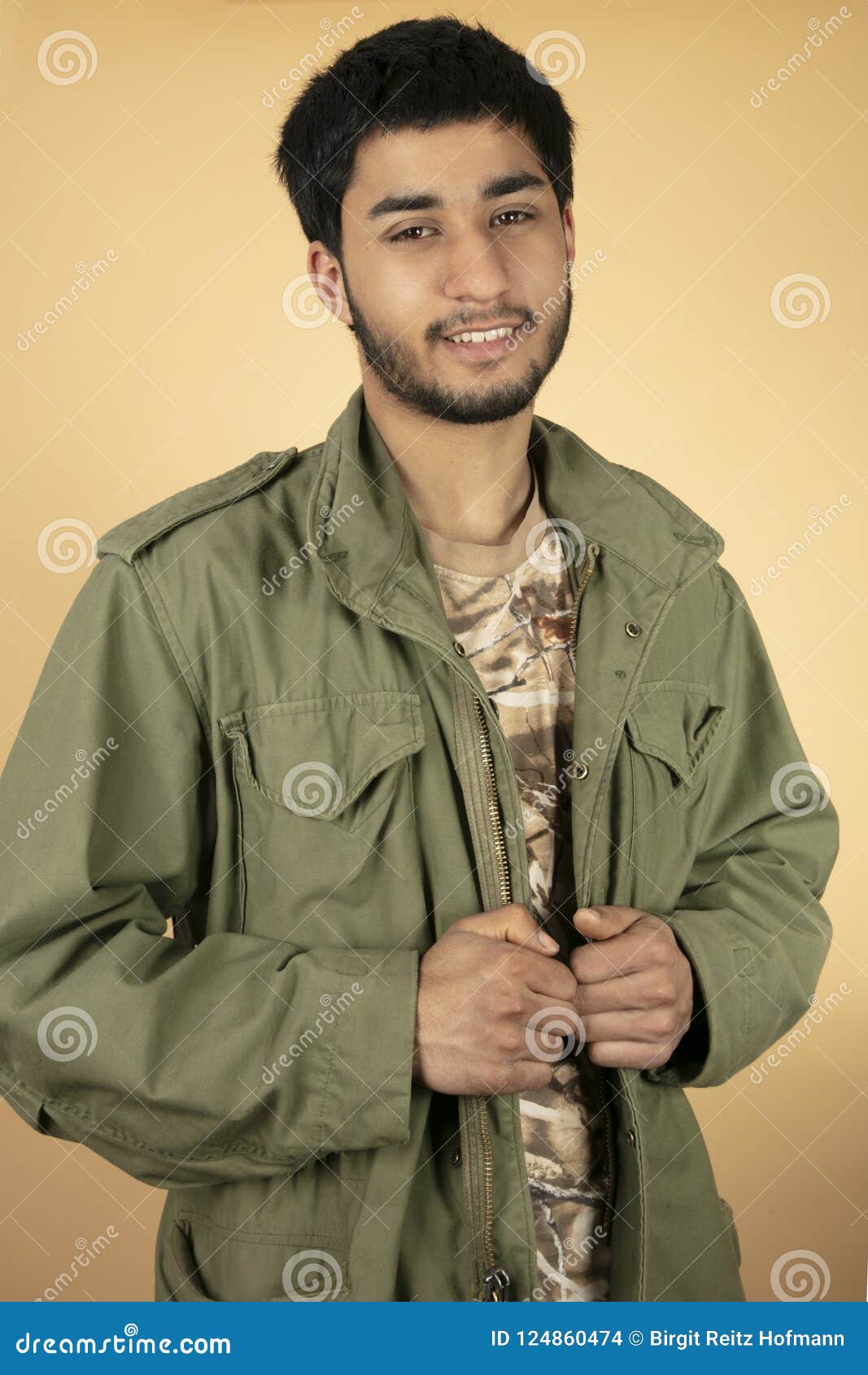 Young Man in Green Military Jacket Stock Photo - Image of people, happy ...