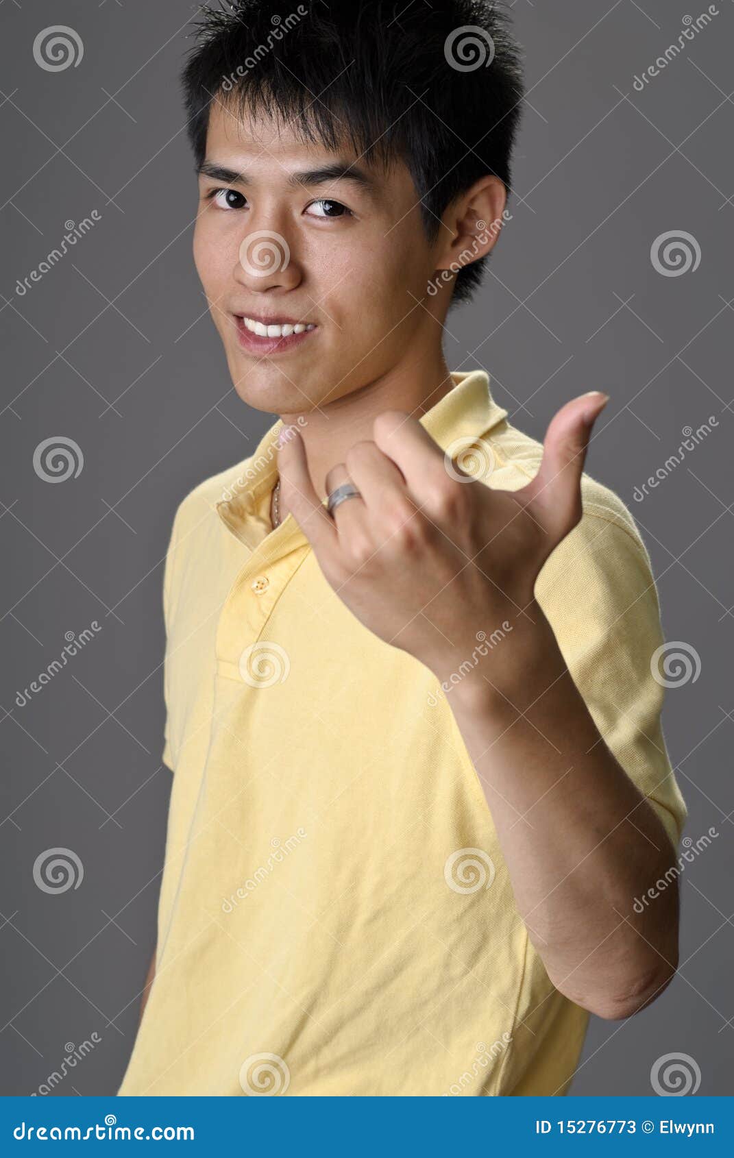 Young Man with Greeting Gesture Stock Image - Image of handsome ...