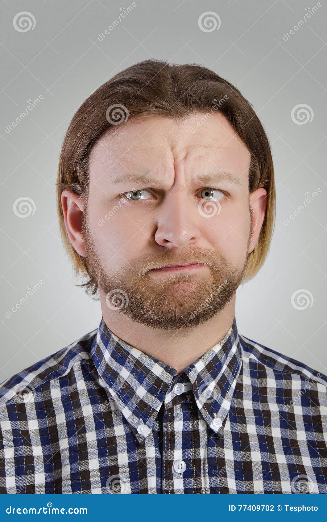 Young man grimace. stock photo. Image of handsome, modern - 77409702