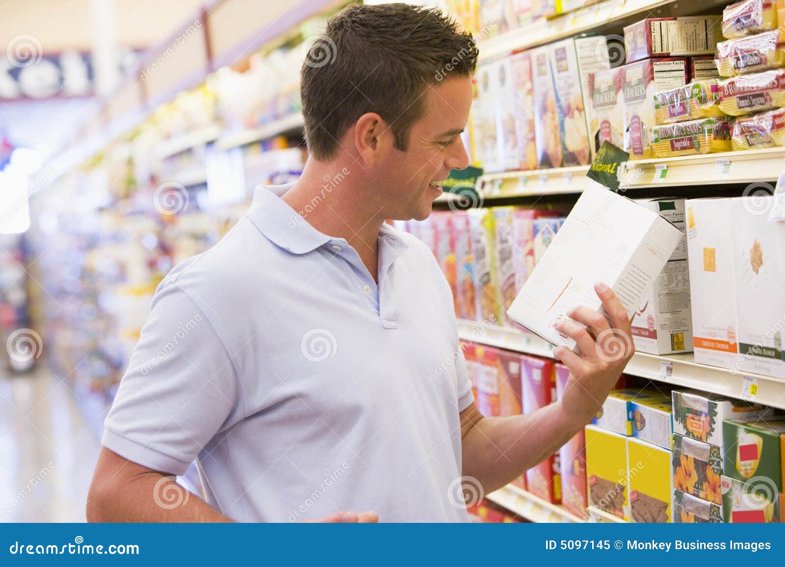 Young man grocery shopping stock image. Image of handsome - 5097145