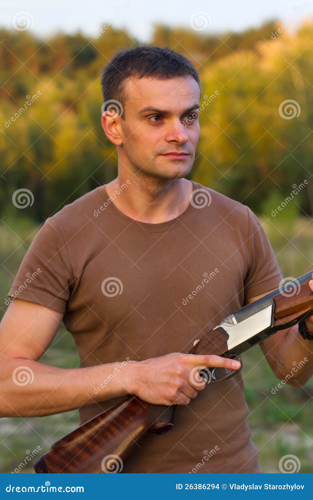 A young man with a gun stock photo. Image of lifestyle - 26386294