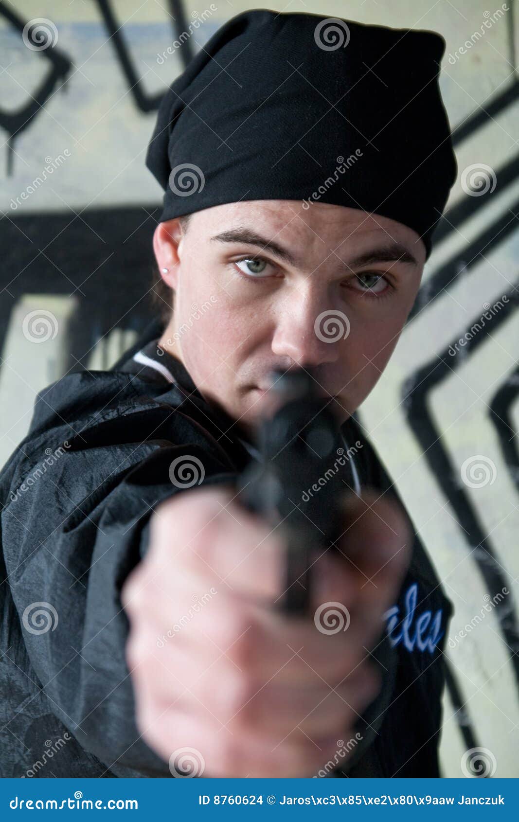 Young man with a gun stock photo. Image of protect, weapon - 8760624