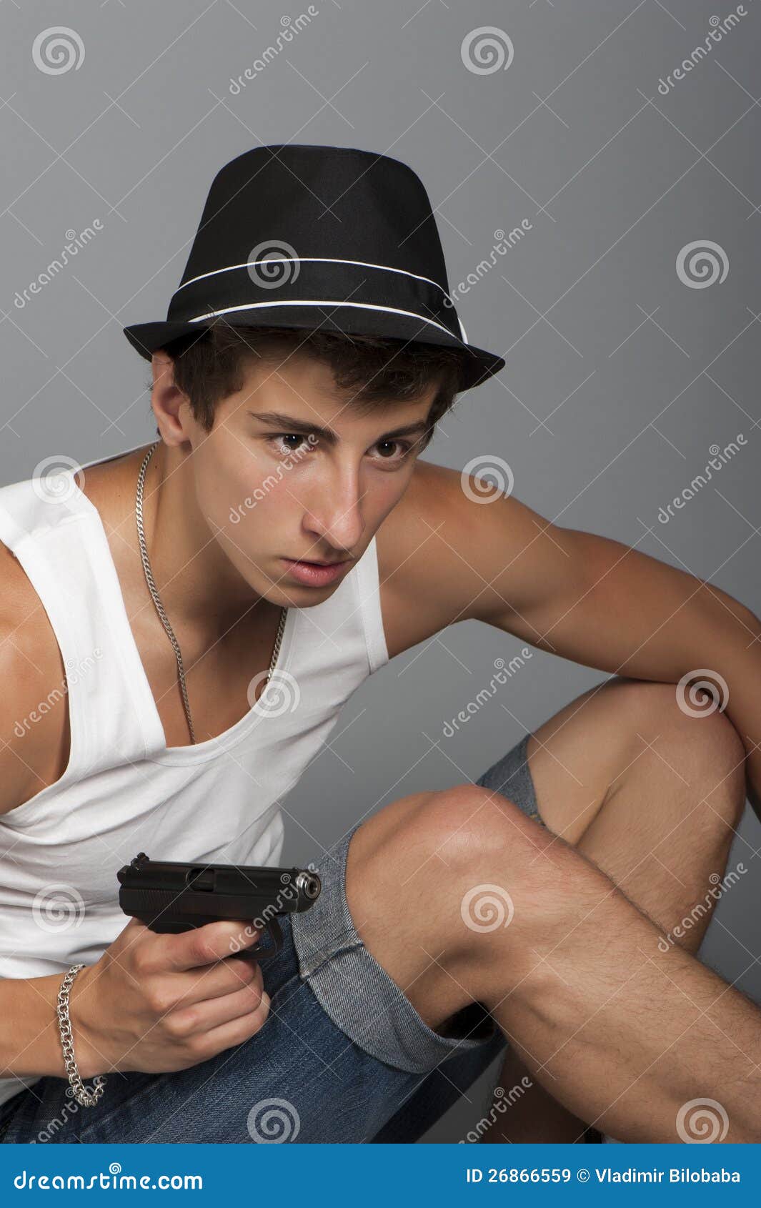 A Young Man with a Gun in His Hand Stock Image - Image of portrait ...