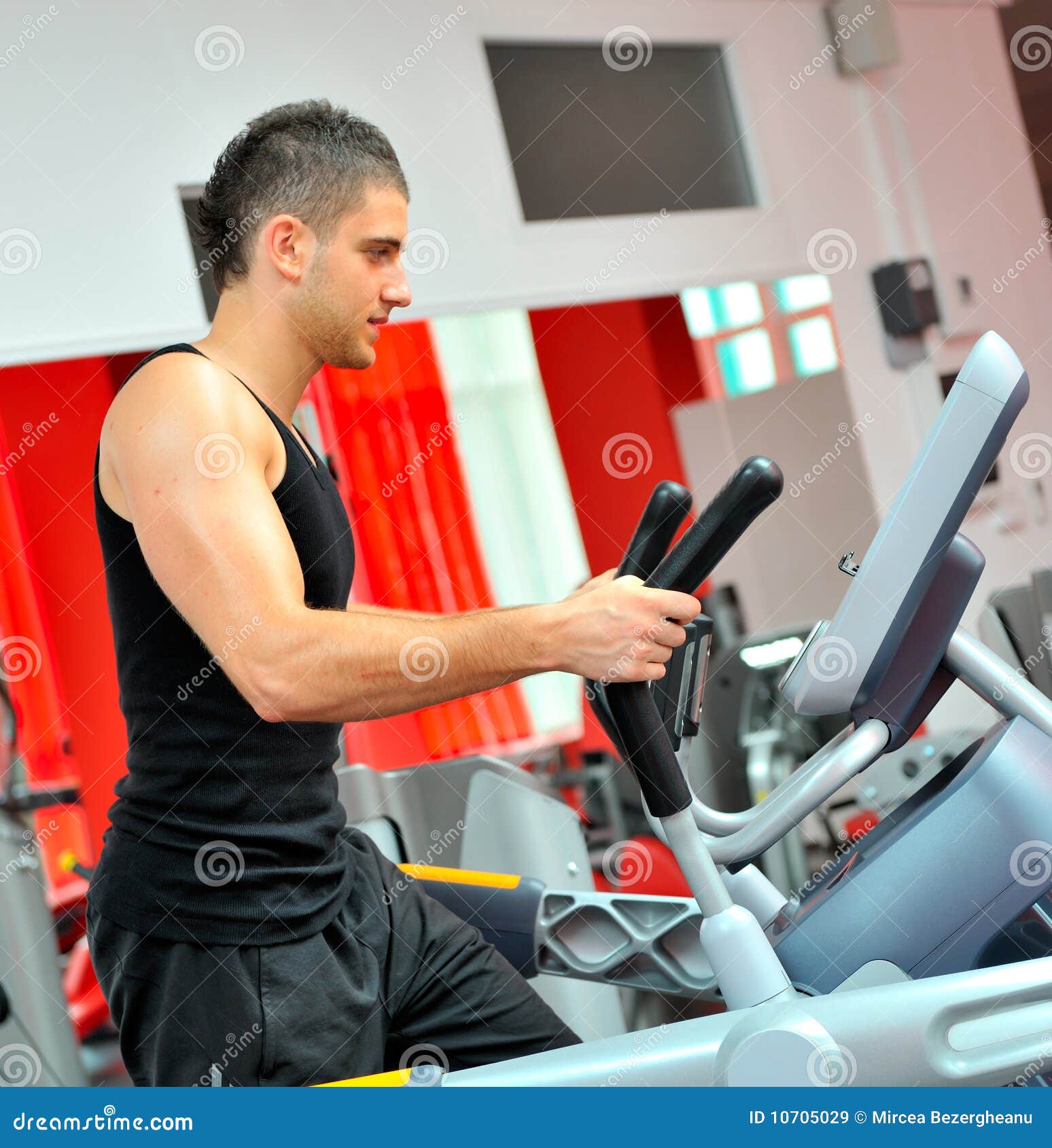 Young man in the gym stock image. Image of instructor - 10705029