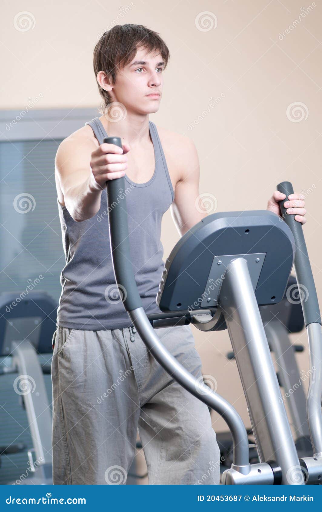 Young Man at the Gym Exercising. Running Stock Image - Image of cute ...